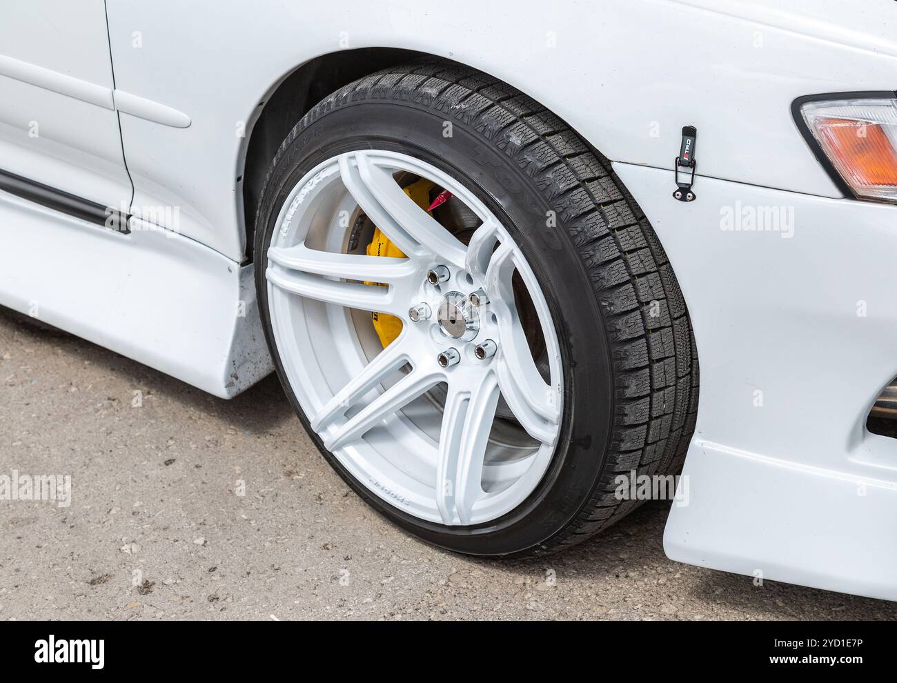 Automotive wheel on light alloy disc with low profile tire Stock Photo - Alamy