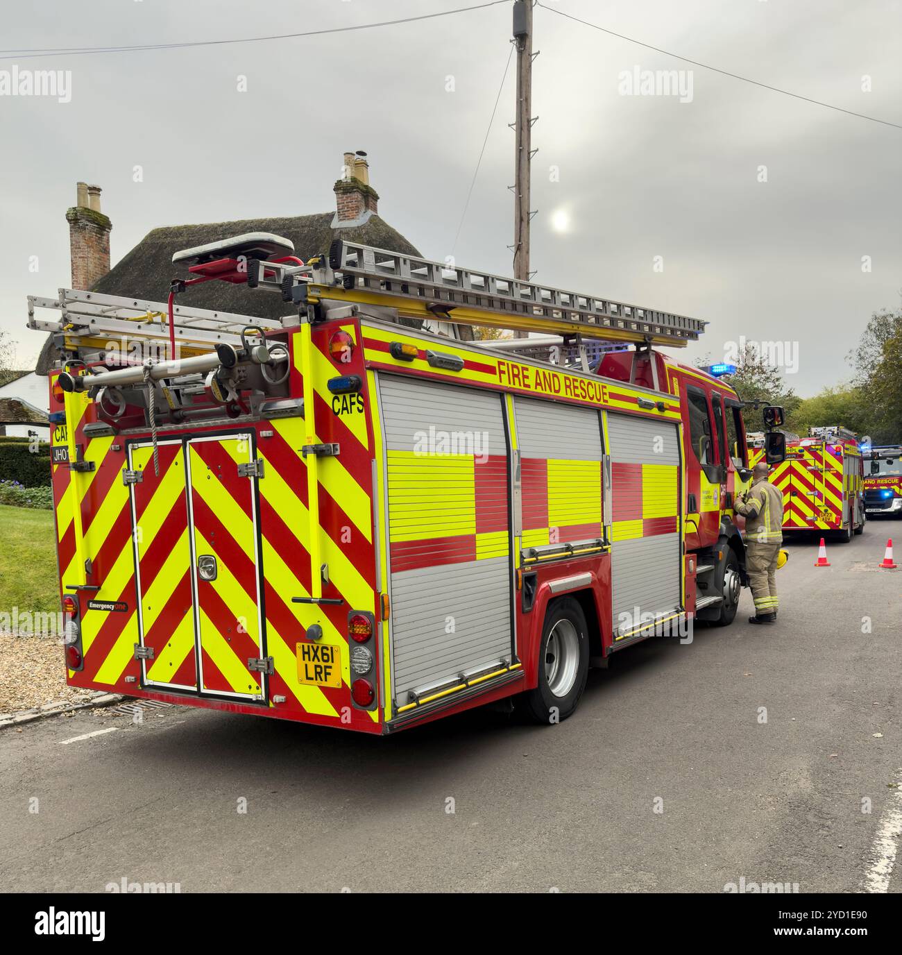 Hampshire England UK. 13.10.2024. Fire and Rescue vehicles attend a fire in a rural village in ...