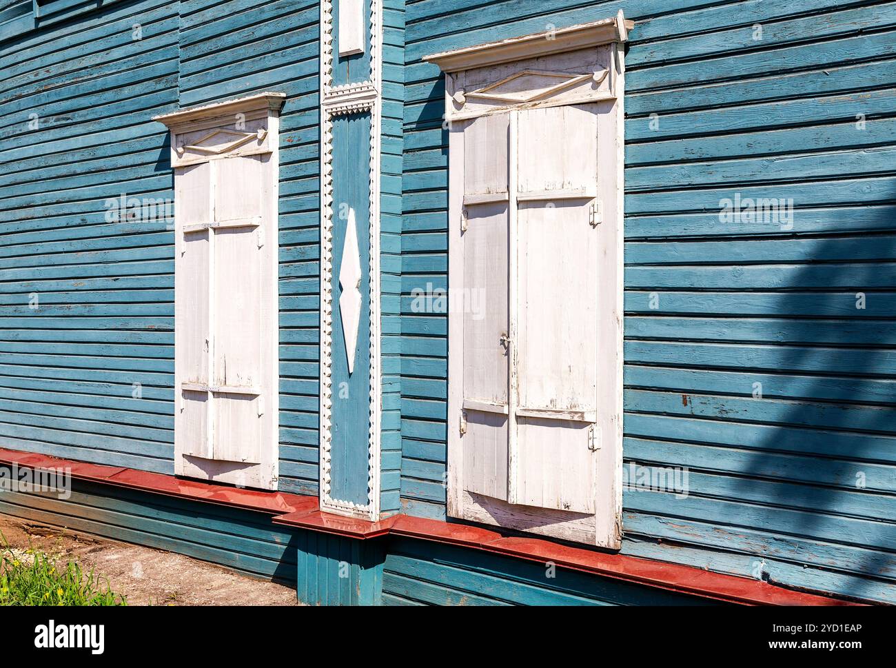 Wooden shutters on the windows of the old house Stock Photo - Alamy