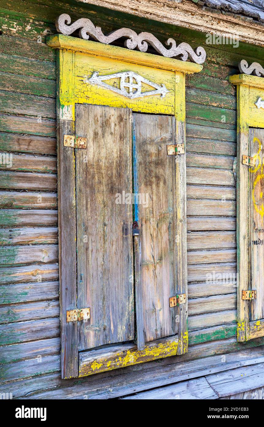 Wooden shutters on the windows of the old house Stock Photo - Alamy