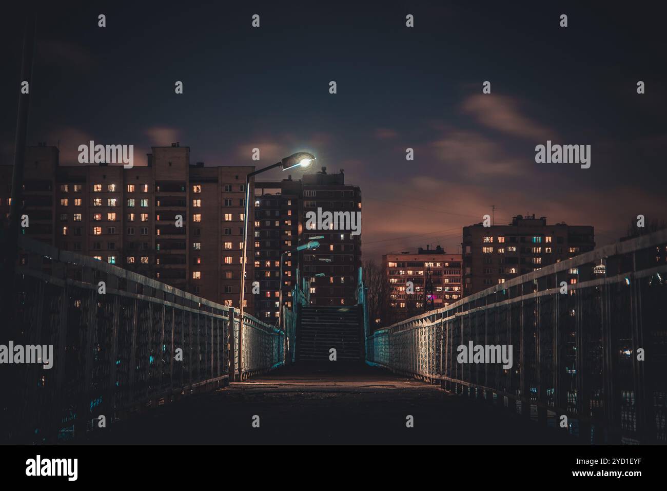 The lights of the night city. High houses at night. Light in the ...