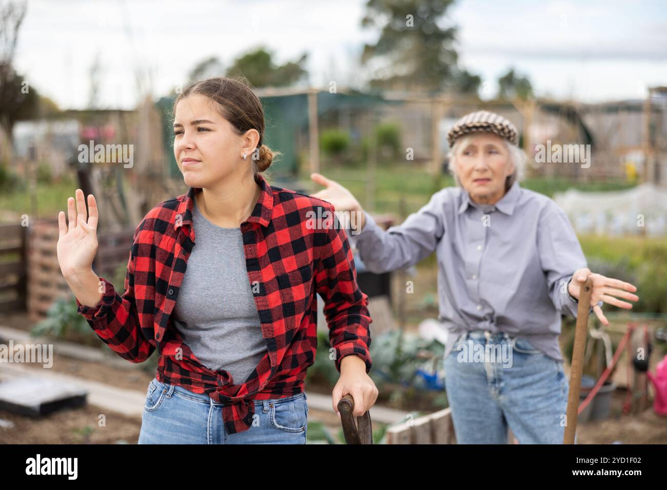 Conflict between female neighbors in country farm Stock Photo - Alamy