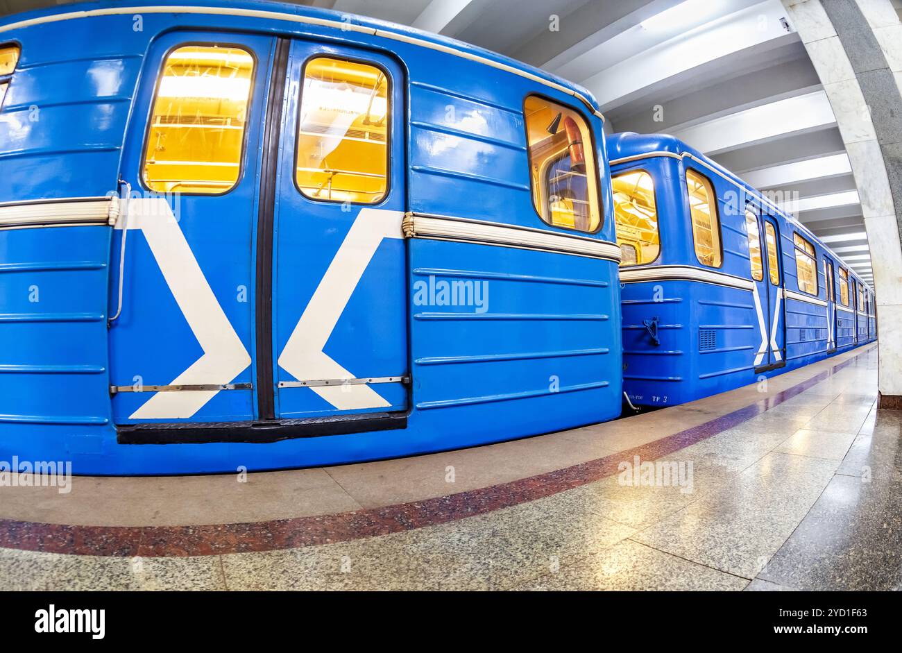 Blue subway train at the underground station Stock Photo - Alamy