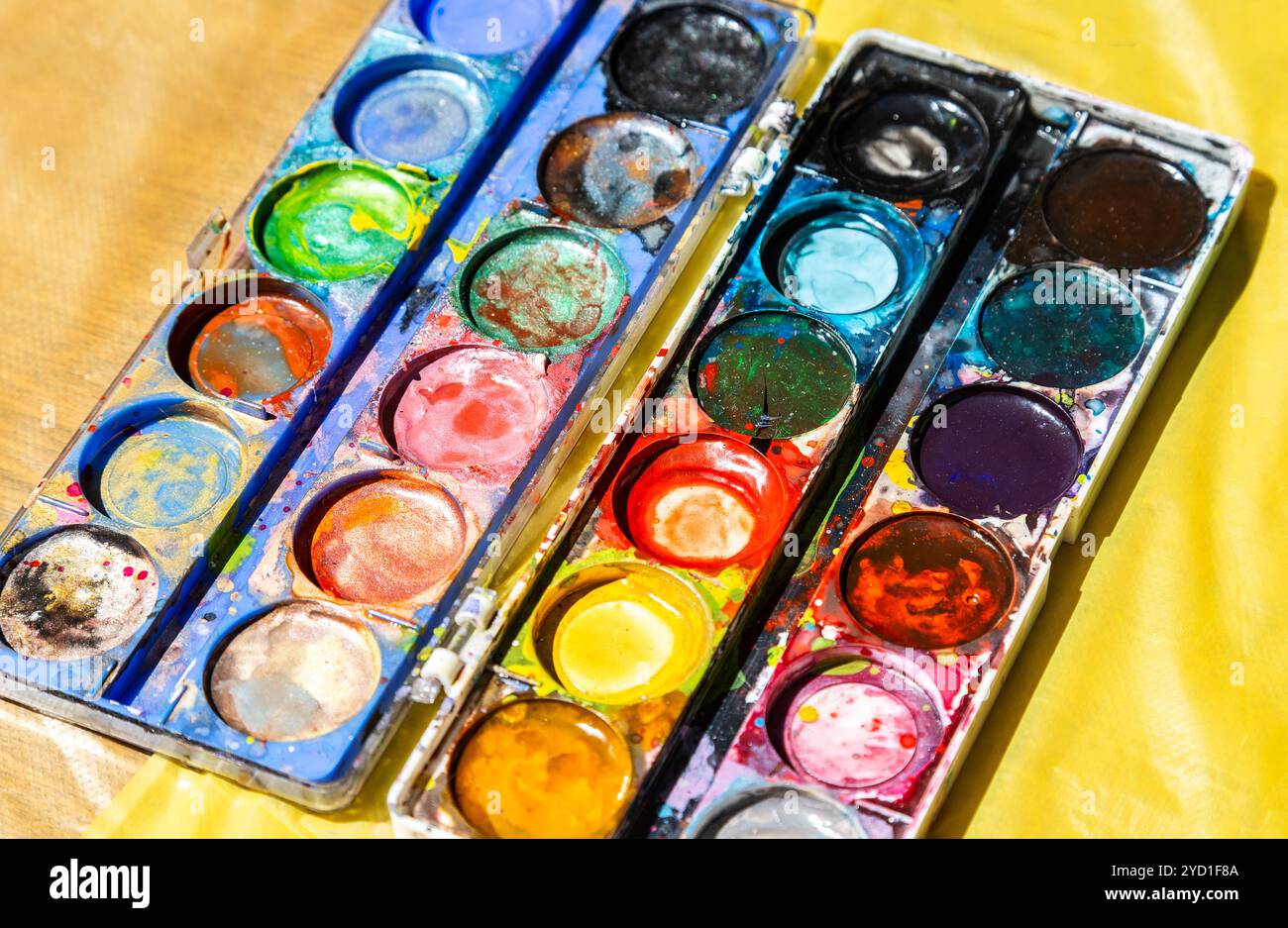 Different used colorful watercolor paint Stock Photo - Alamy