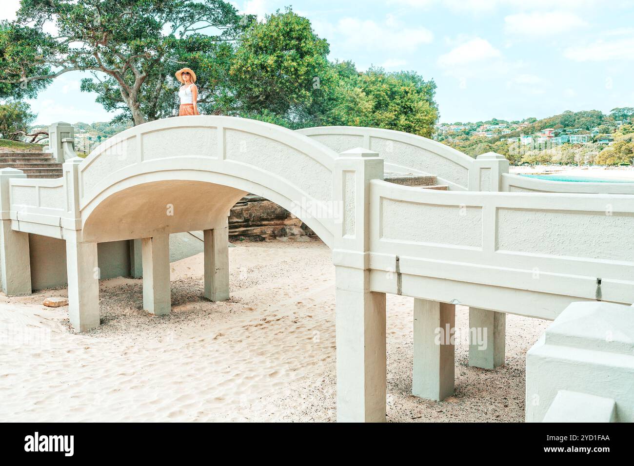 Woman standing on arched bridge at Balmoral Beach Stock Photo - Alamy