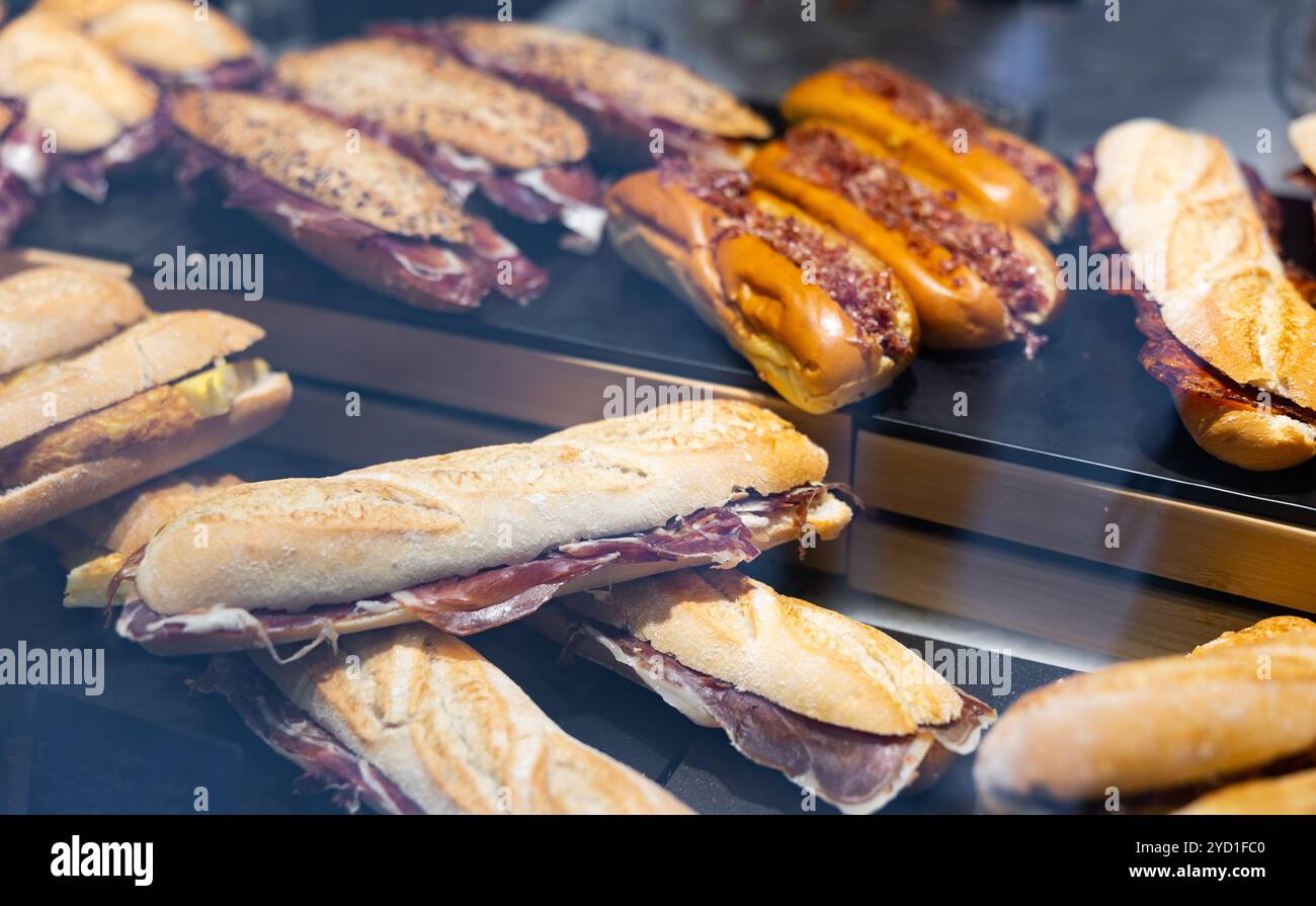 Bocadillos on showcase of spanish fast food cafe Stock Photo - Alamy