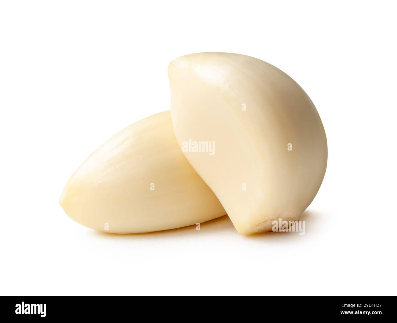 Side view of peeled garlic cloves in stack are isolated on white ...