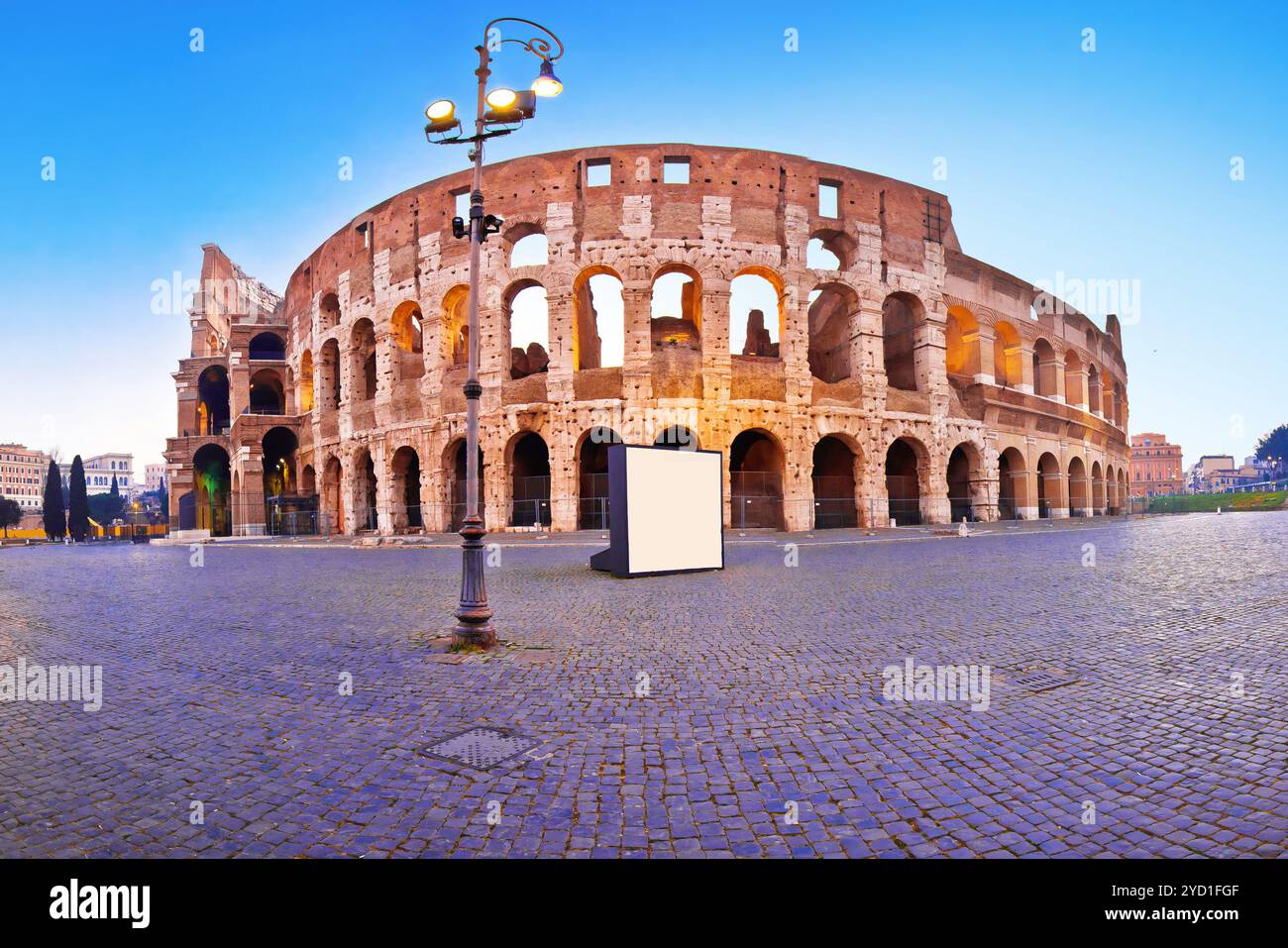 Colosseum square panoramic dawn view in Rome Stock Photo - Alamy