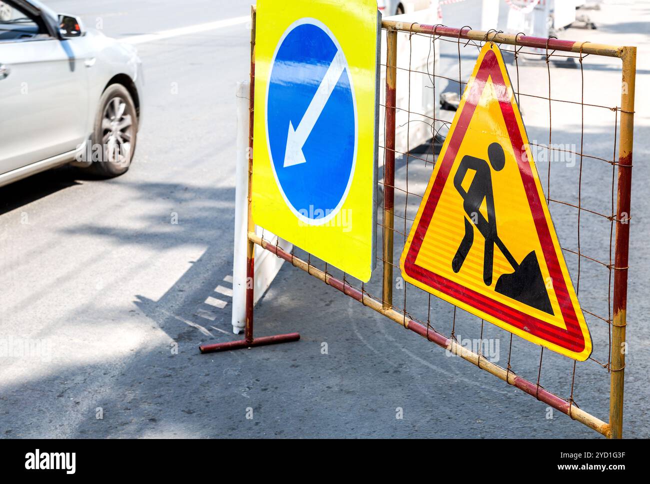 Keep left road sign at the city street Stock Photo - Alamy