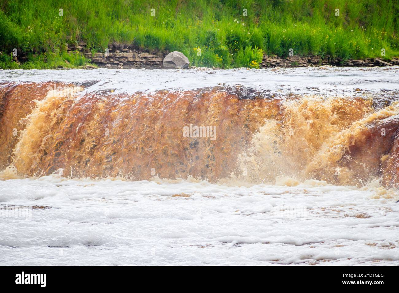 Sablinsky waterfalls. Little waterfall. The brown water of the ...