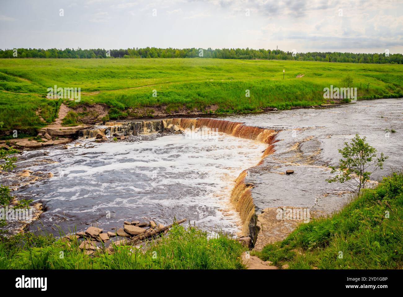 Sablinsky waterfalls. Little waterfall. The brown water of the ...