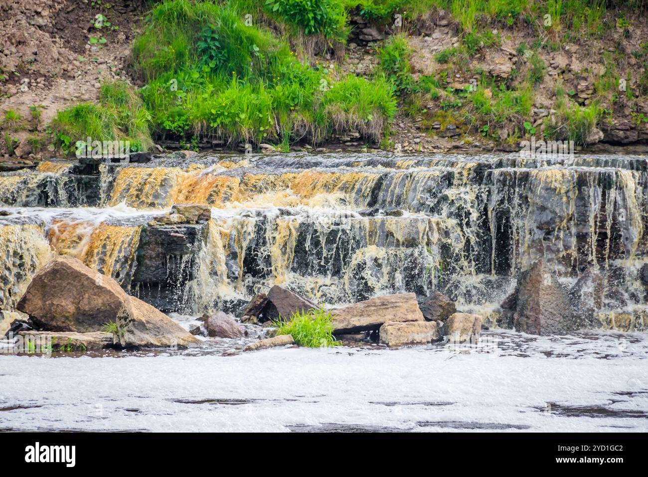 Sablinsky waterfalls. Little waterfall. The brown water of the ...