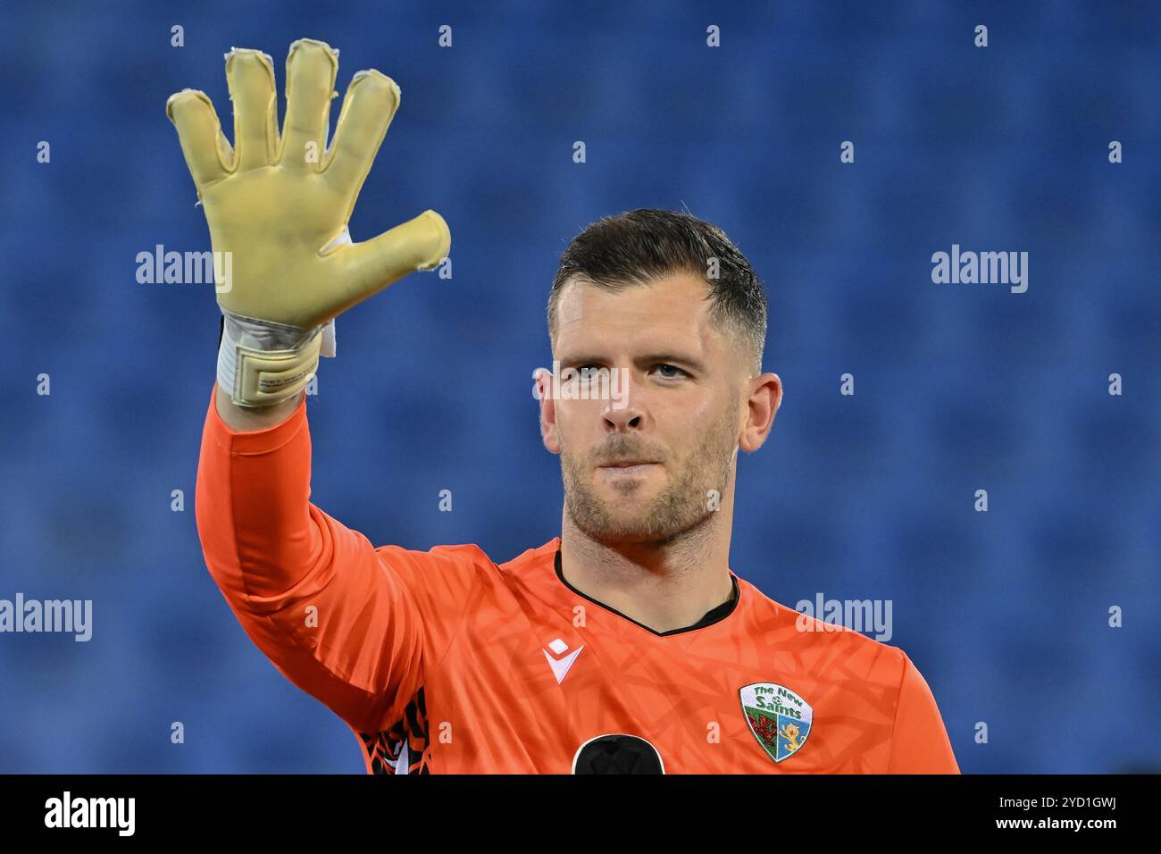 Connor Roberts of The New Saints waves to fans as he lines up ahead of ...