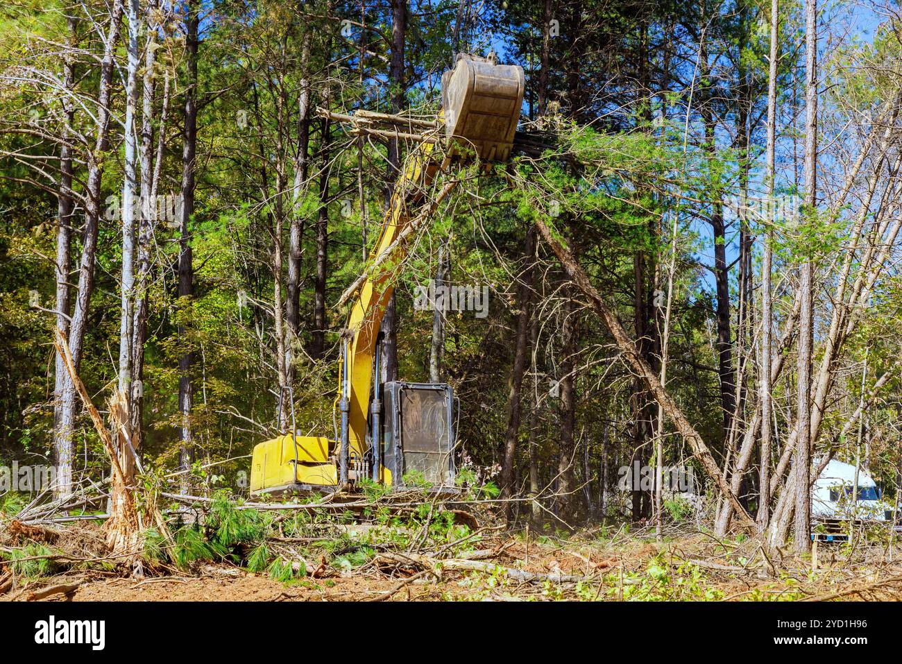 An excavator is used by contractor when preparing construction site ...
