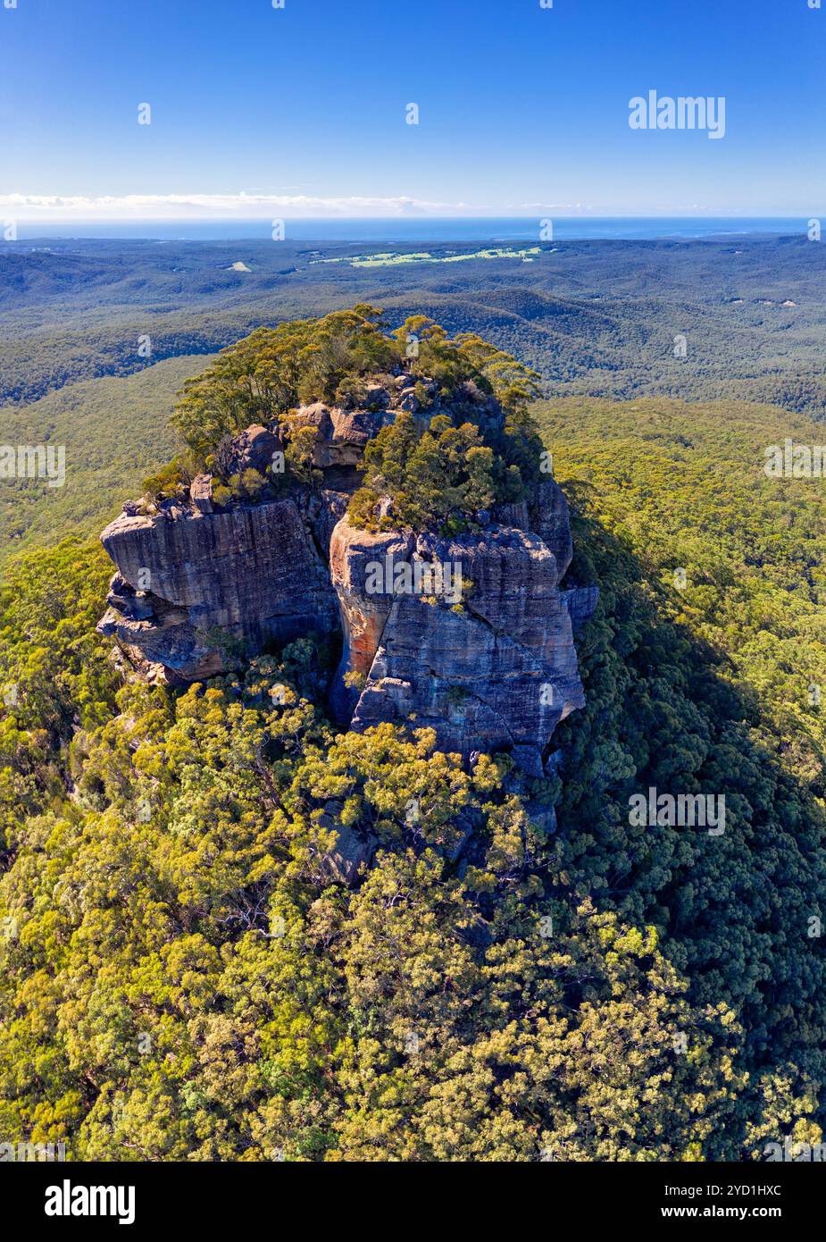 The pyramid shaped mountain has a stony crown top. From a distance it ...