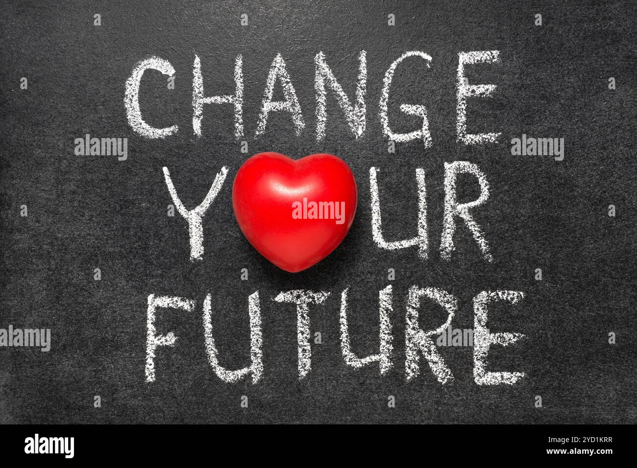 change your future phrase handwritten on blackboard with heart symbol ...