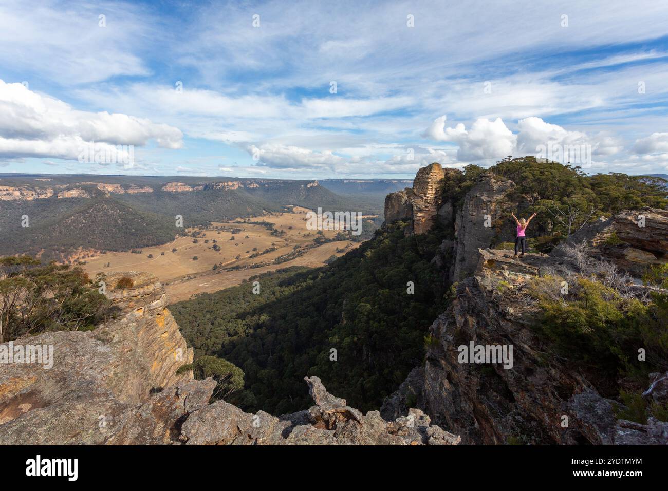 Adventurous hiker explorer reaching the top slab of Donkey Mountain ...
