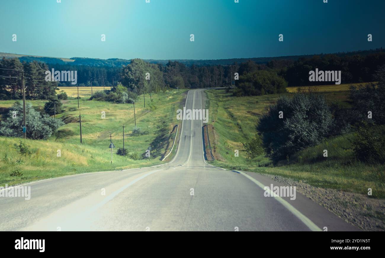 Russian asphalt roads. Highway. Road trip. The car goes on the road ...