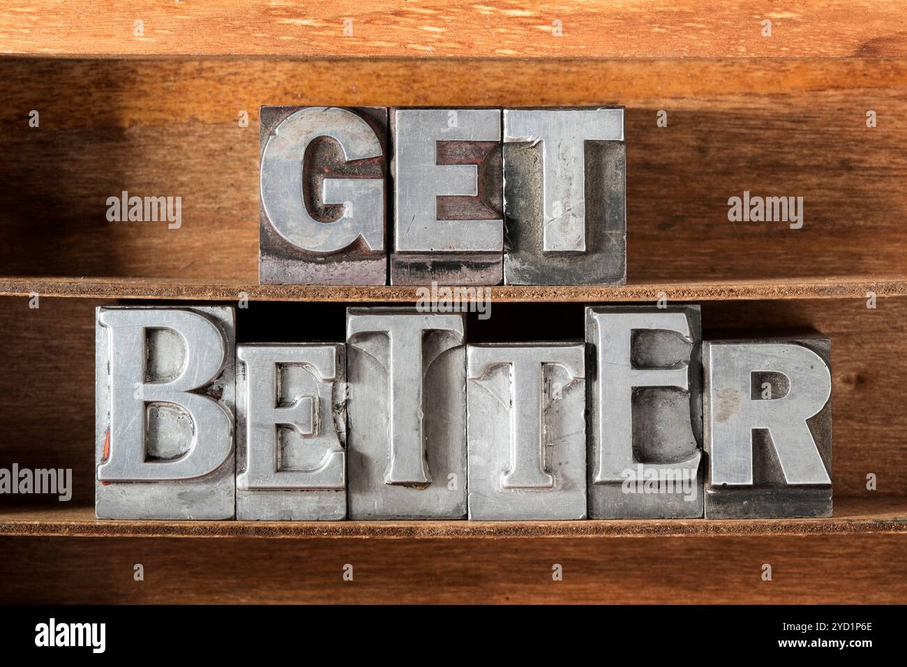 get better phrase made from metallic letterpress type on wooden tray ...