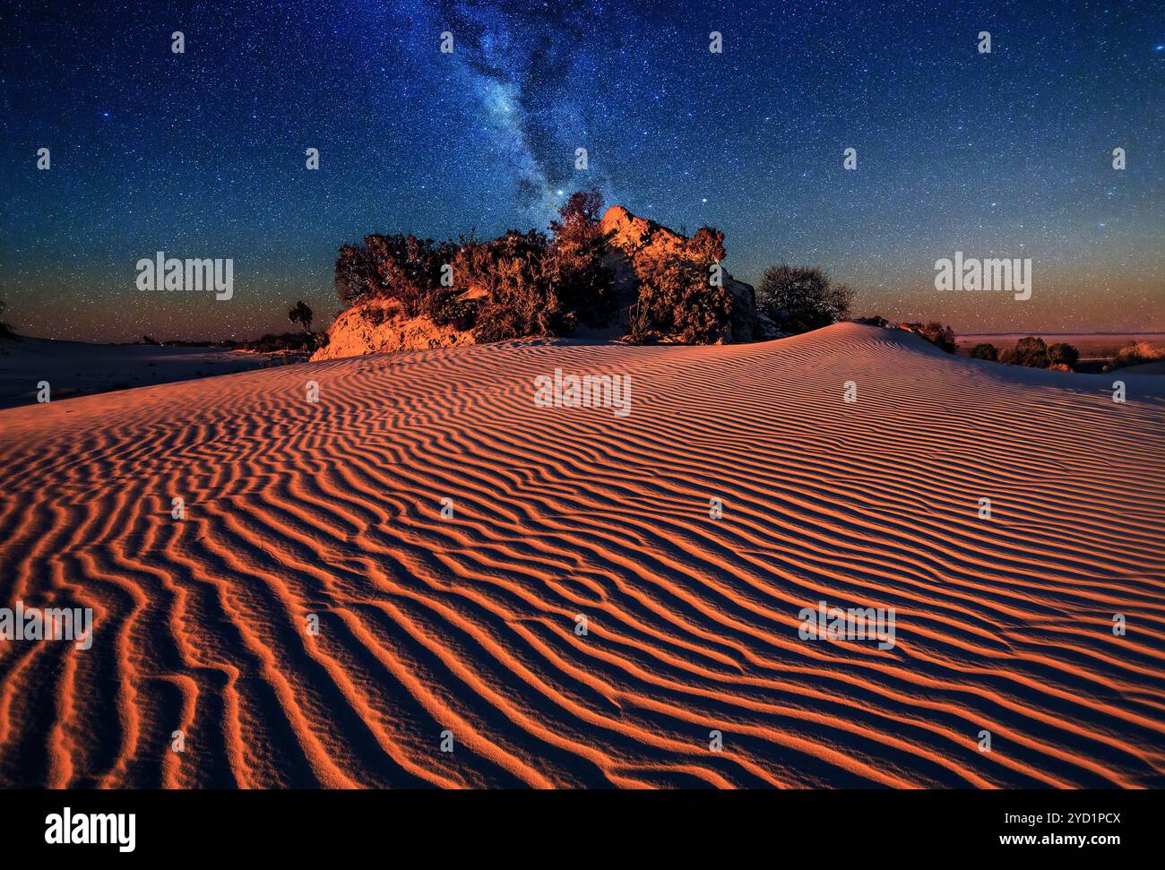 Sand dunes under starry night sky Stock Photo - Alamy