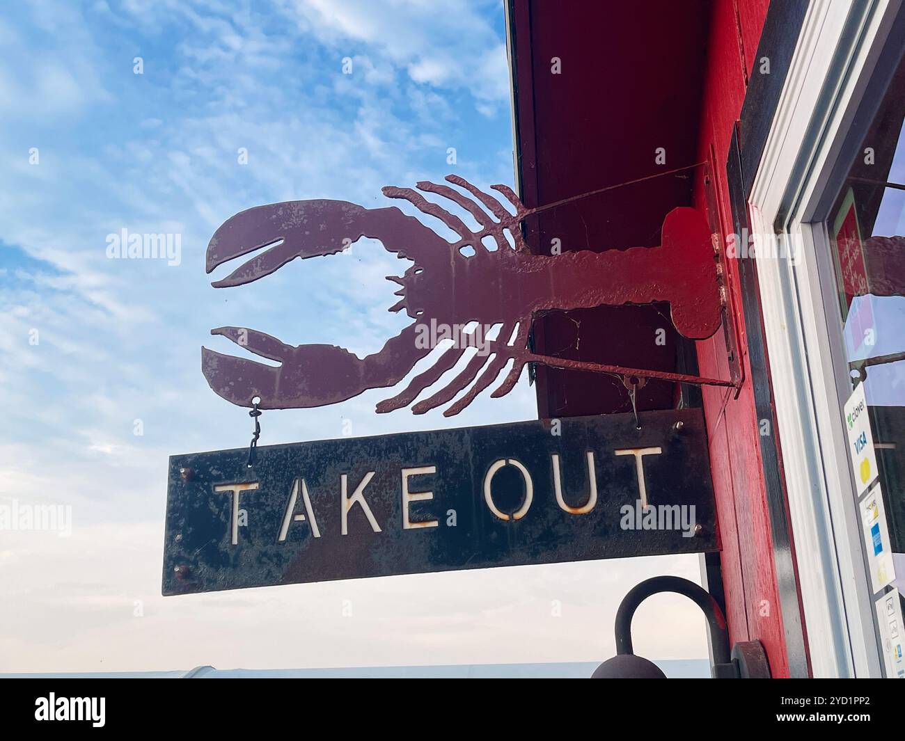The metal, red, lobster cutout sign for Take Out. At Perry Long's ...