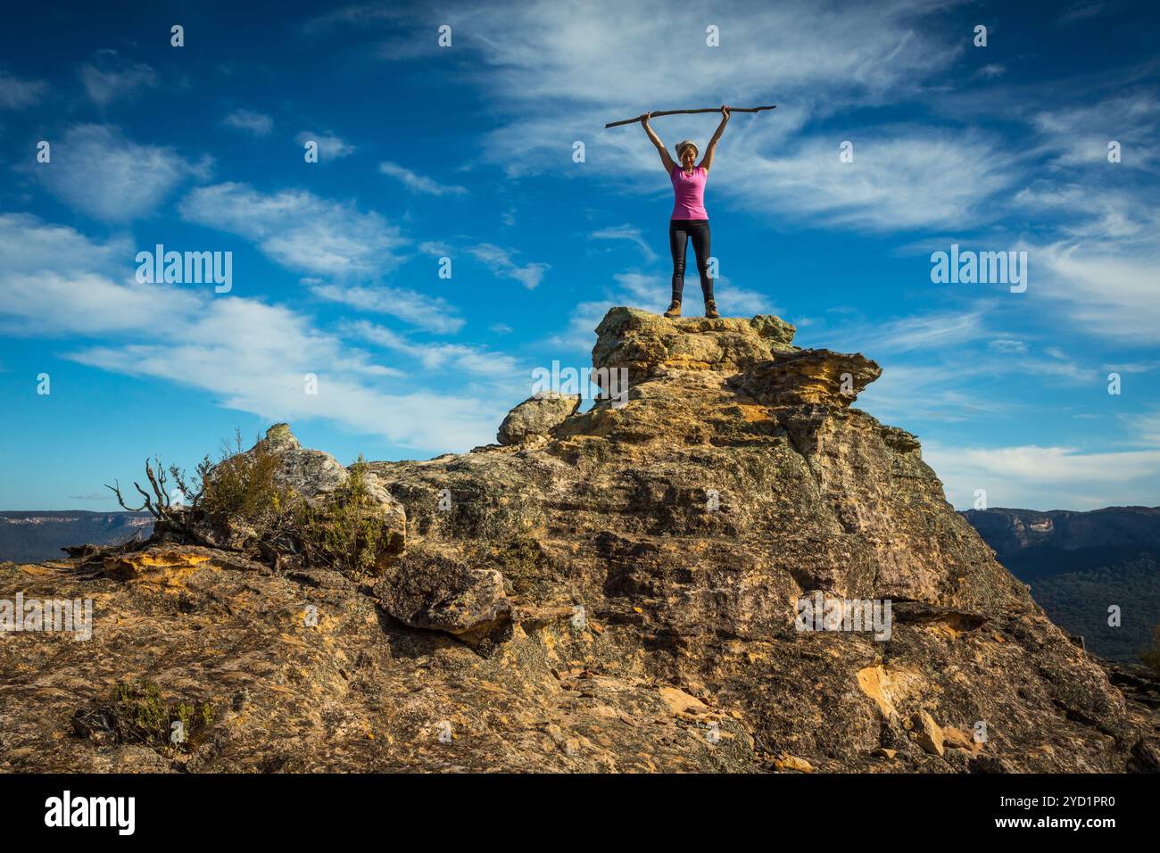 Standing on top of rocky top in Gardens of Stone Stock Photo - Alamy