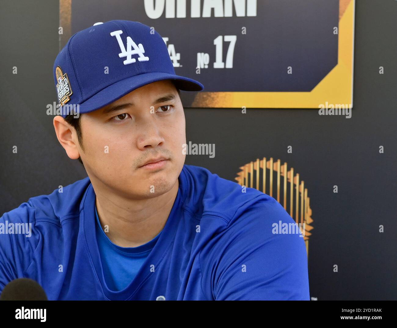 Los Angeles Dodgers designated hitter Shohei Ohtani speaks to the media ...