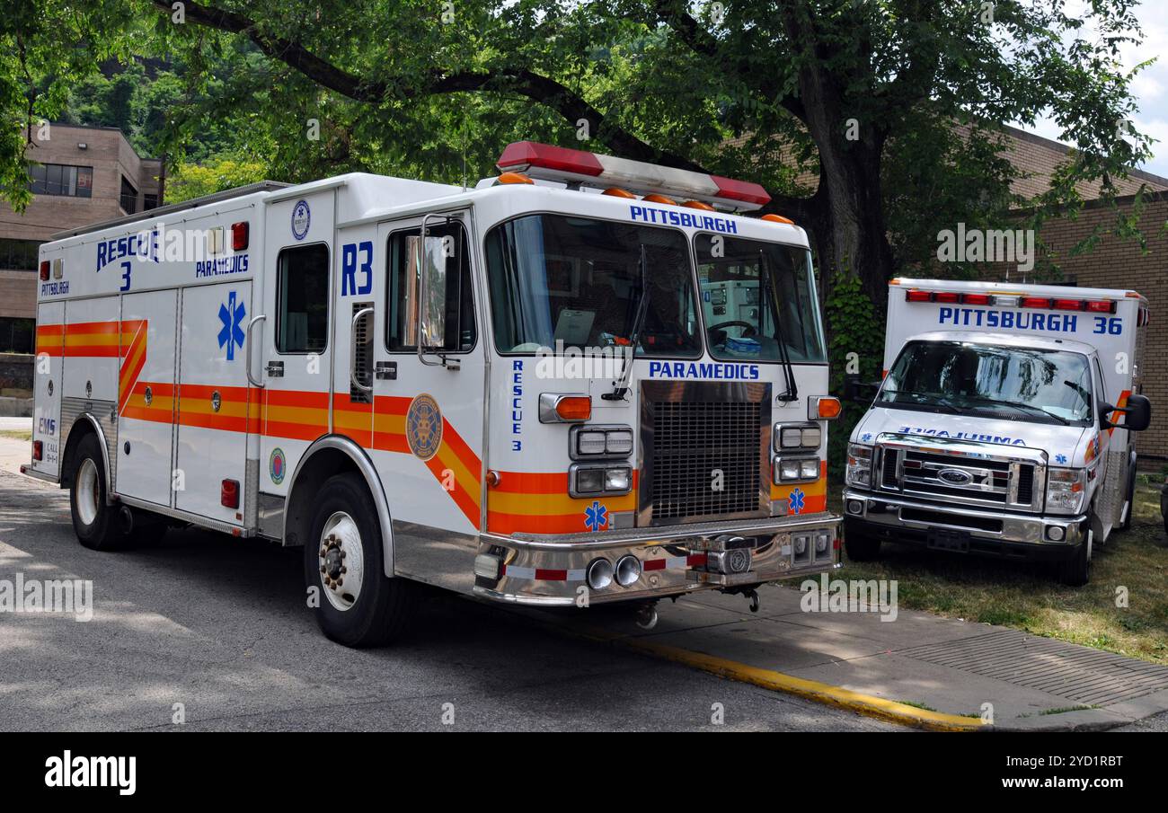 Emergency vehicles including an ambulance and rescue truck from ...