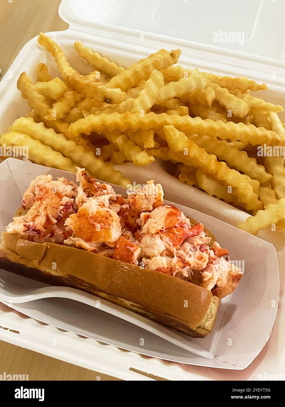 The standard lobster roll, on a buttered, New England style hot dog bun ...