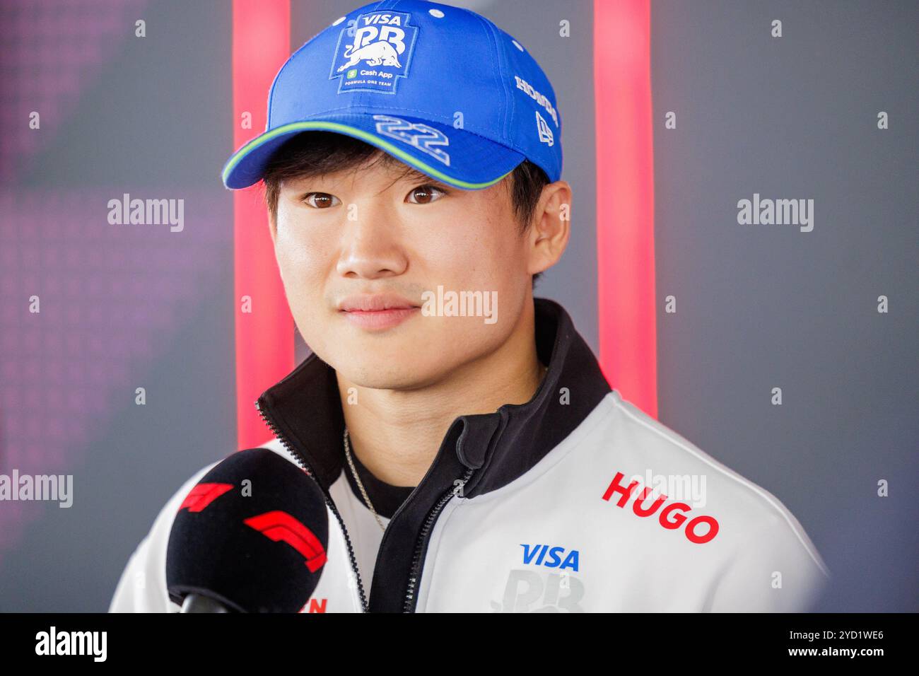Yuki Tsunoda of Japan and Visa Cash App RB Formula 1 Team talks to ...