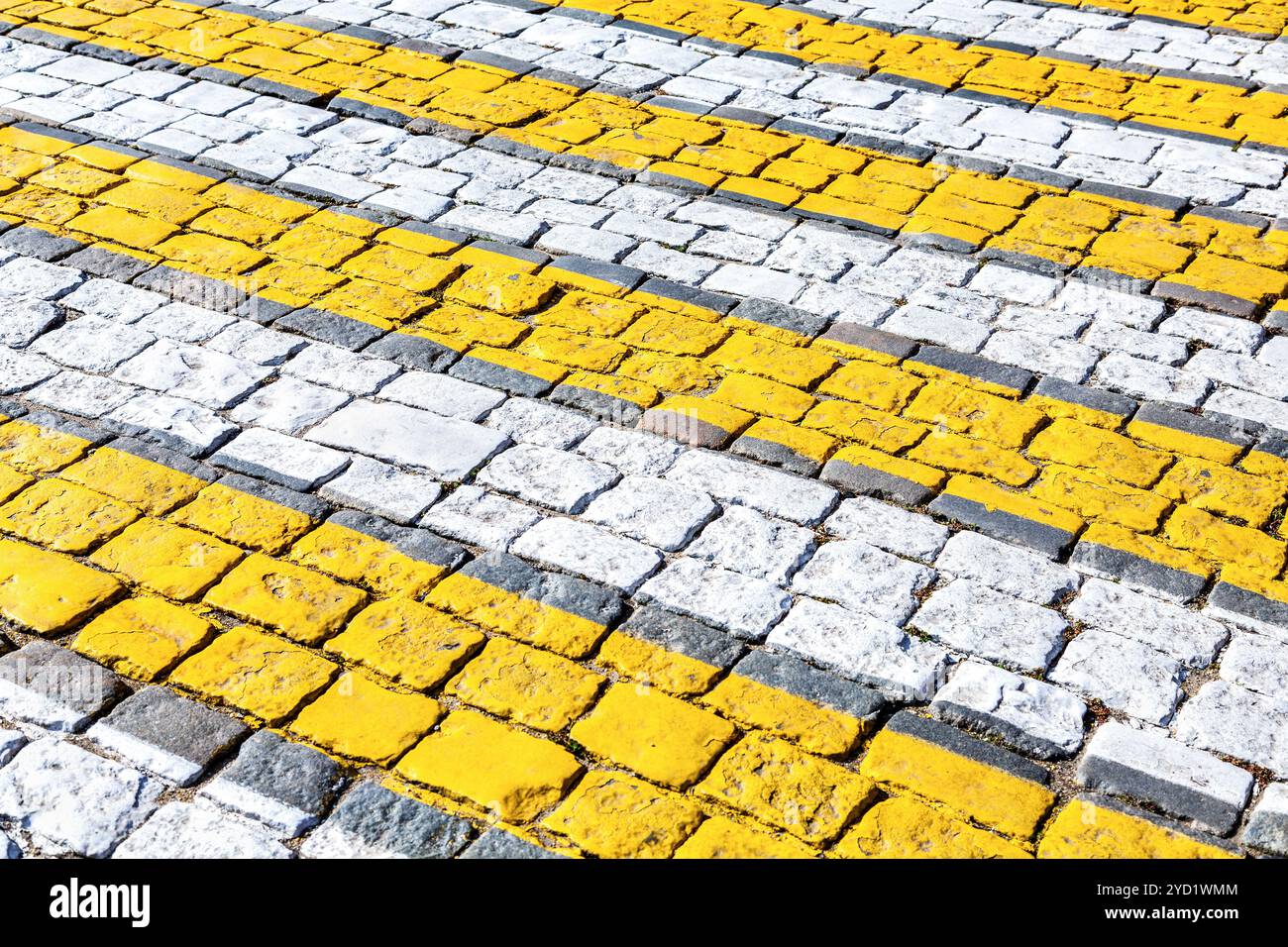 Pedestrian crossing with white and yellow stripes Stock Photo - Alamy