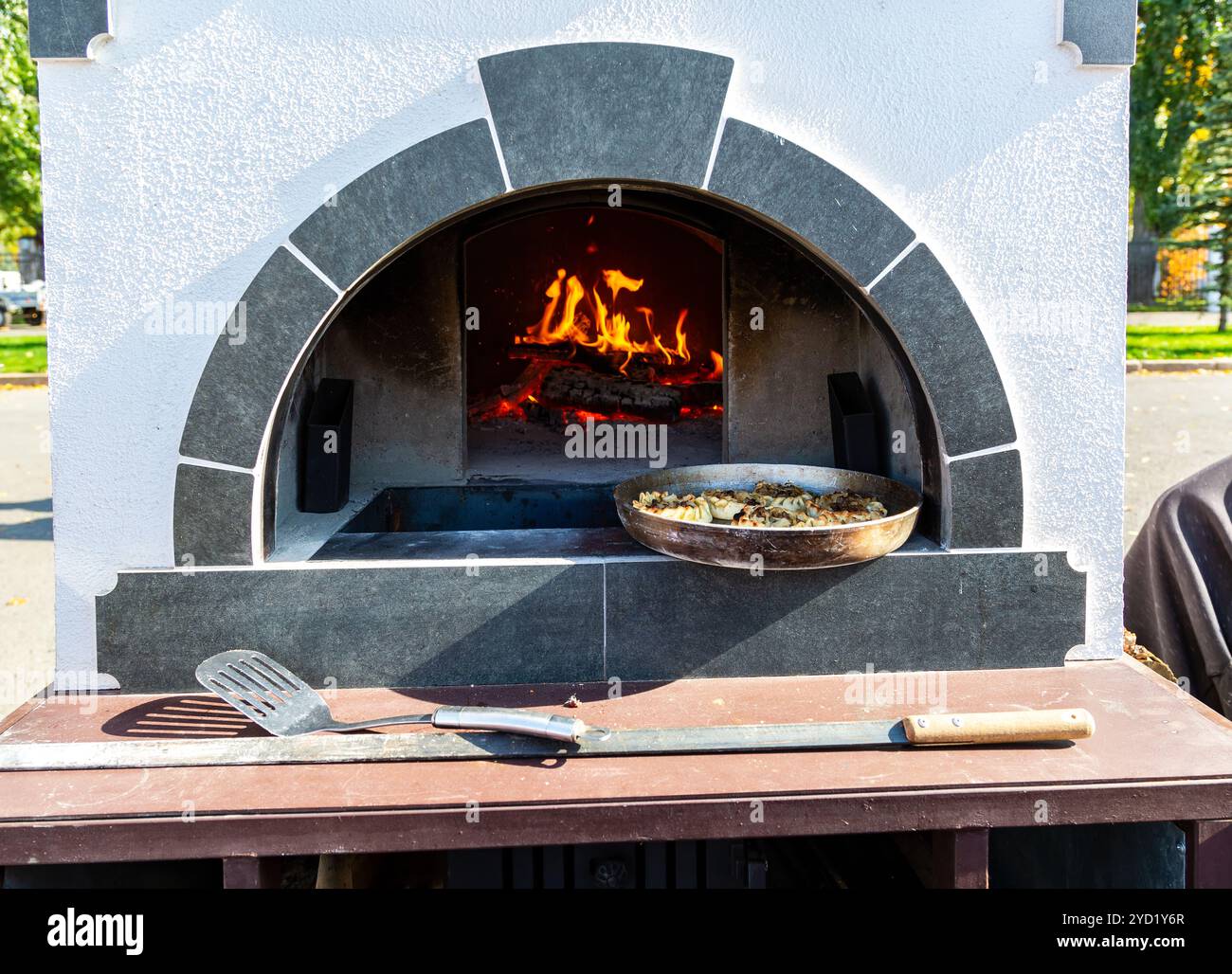 Cooking traditional pies in a Russian oven Stock Photo - Alamy