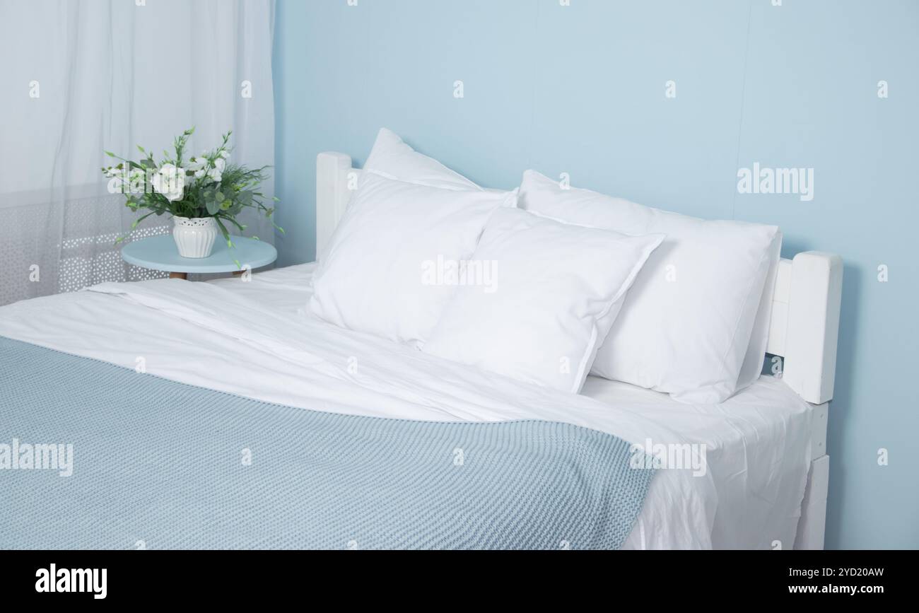 Double bed with lifting mechanism and mattress. The white mattress ...