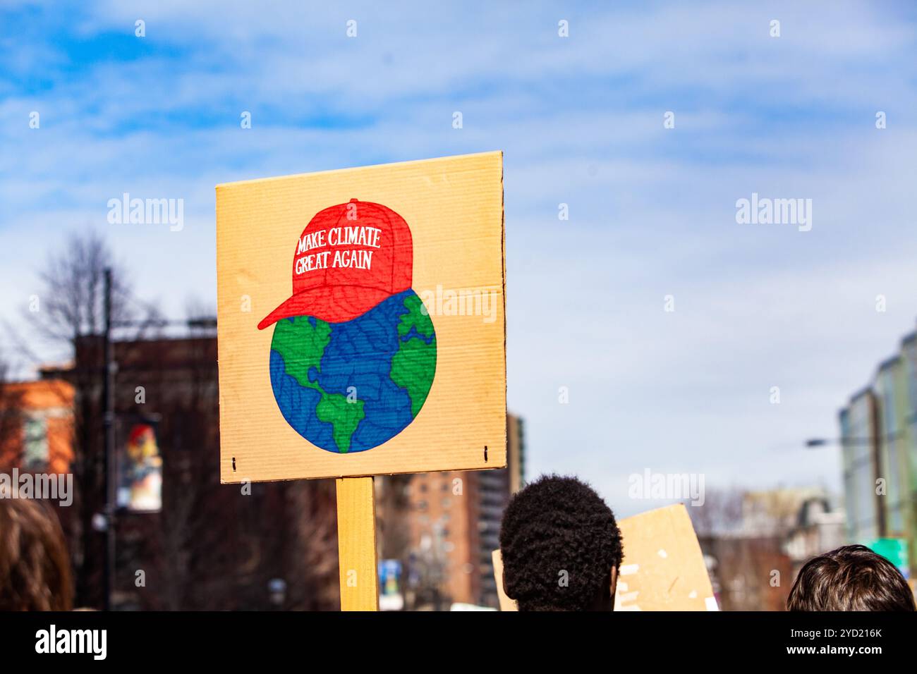 Placard by ecological protestor at rally Stock Photo - Alamy