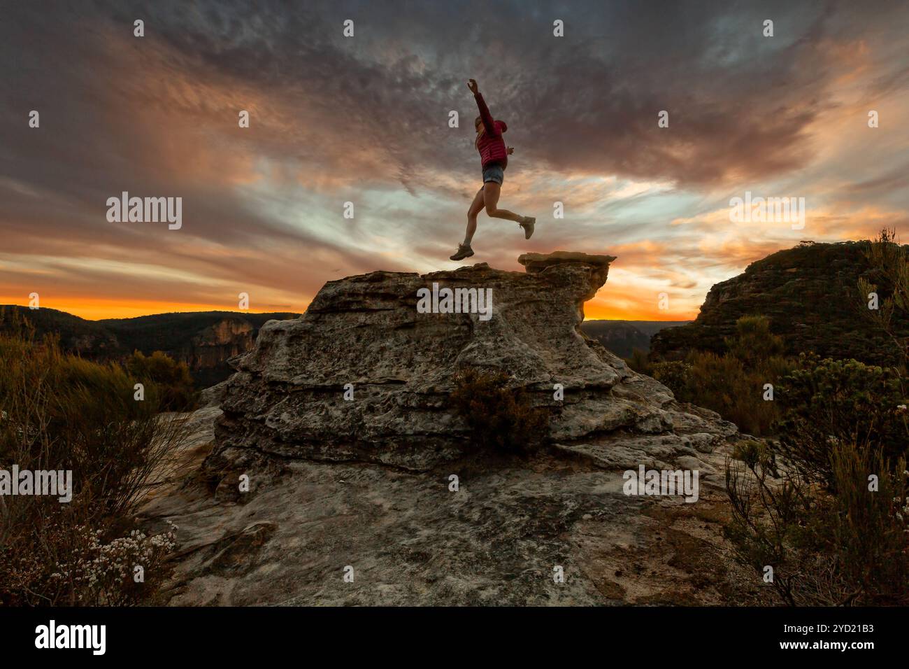 Beautiful woman on cliffs hi-res stock photography and images - Alamy