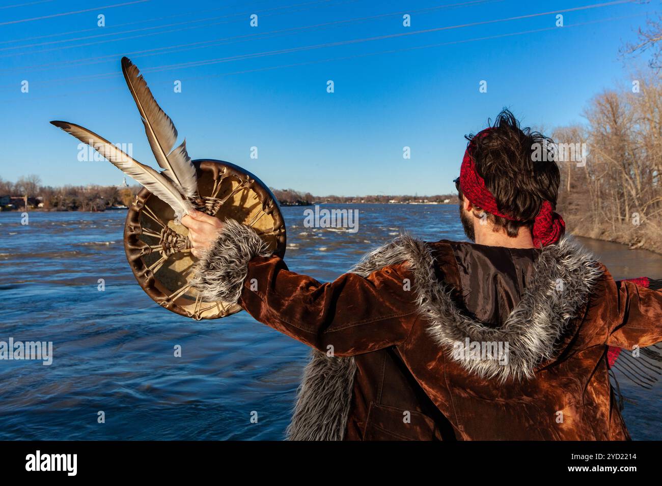 Spiritual man worships natural river Stock Photo - Alamy