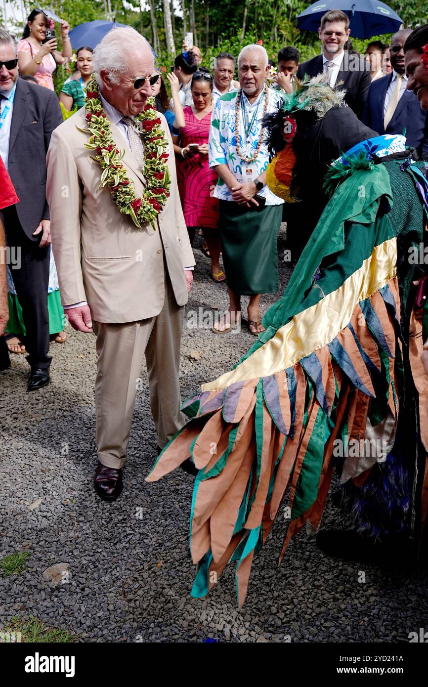King Charles III meets a mascot of the national bird of Samoa, the ...