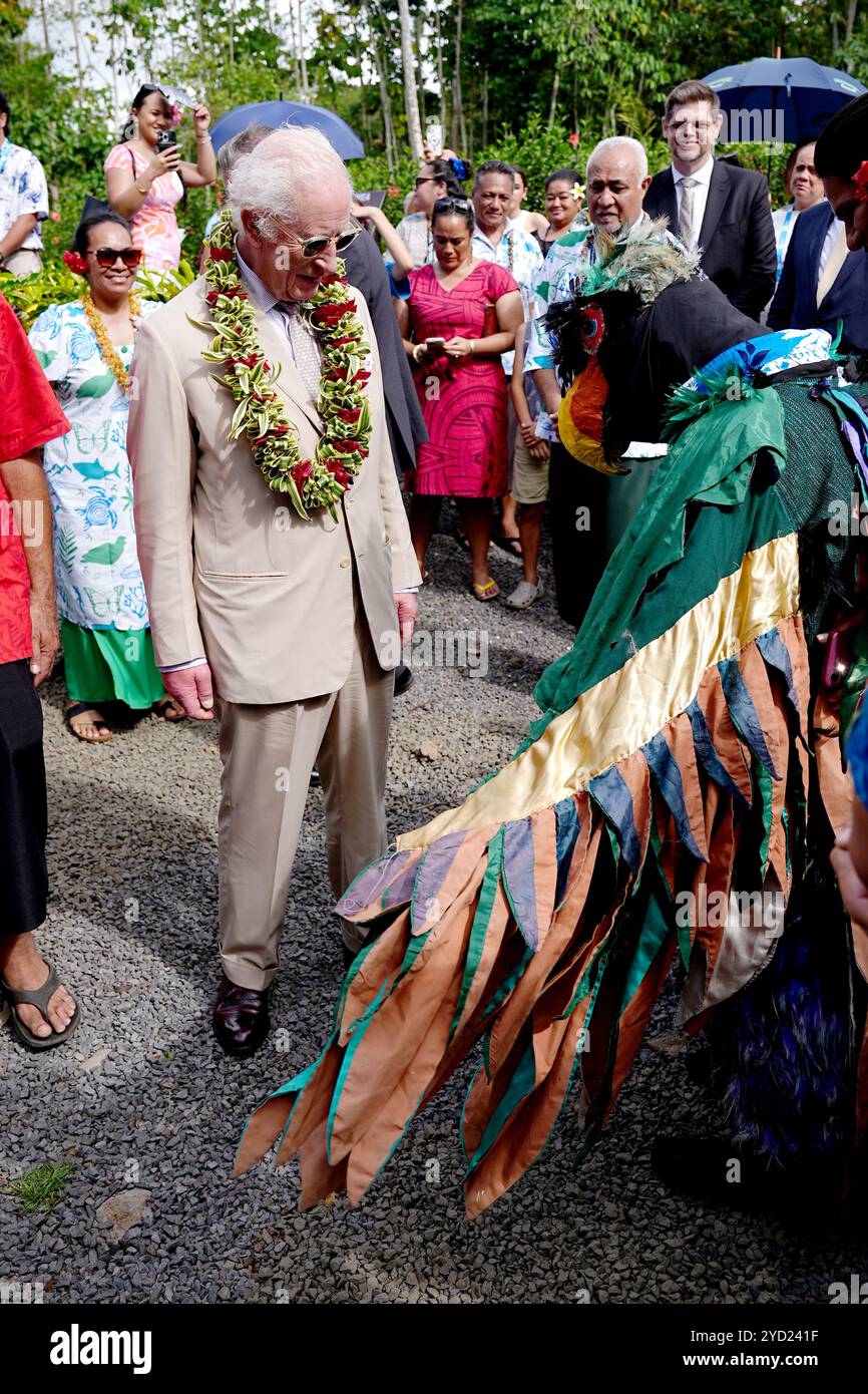 King Charles III meets a mascot of the national bird of Samoa, the ...