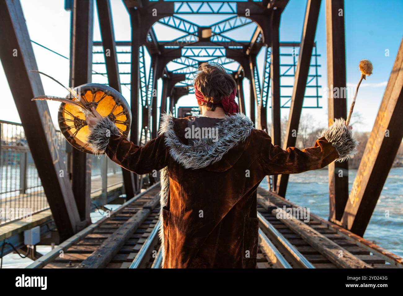 Sacred man views modern engineering Stock Photo - Alamy