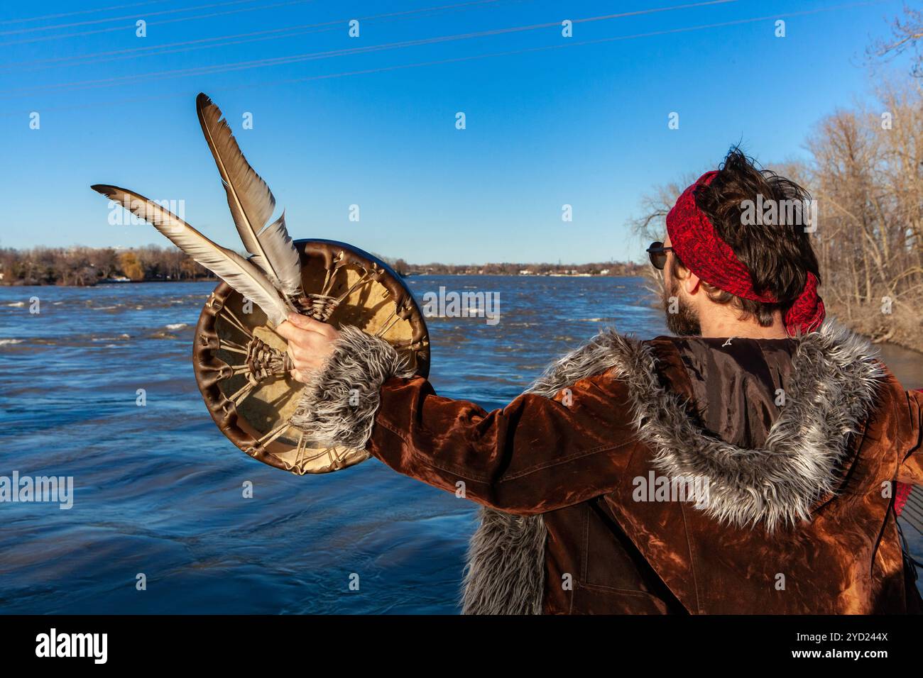 Spiritual man worships natural river Stock Photo - Alamy