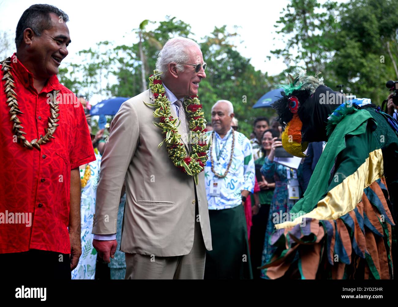 King Charles III meets a mascot of the national bird of Samoa, the ...