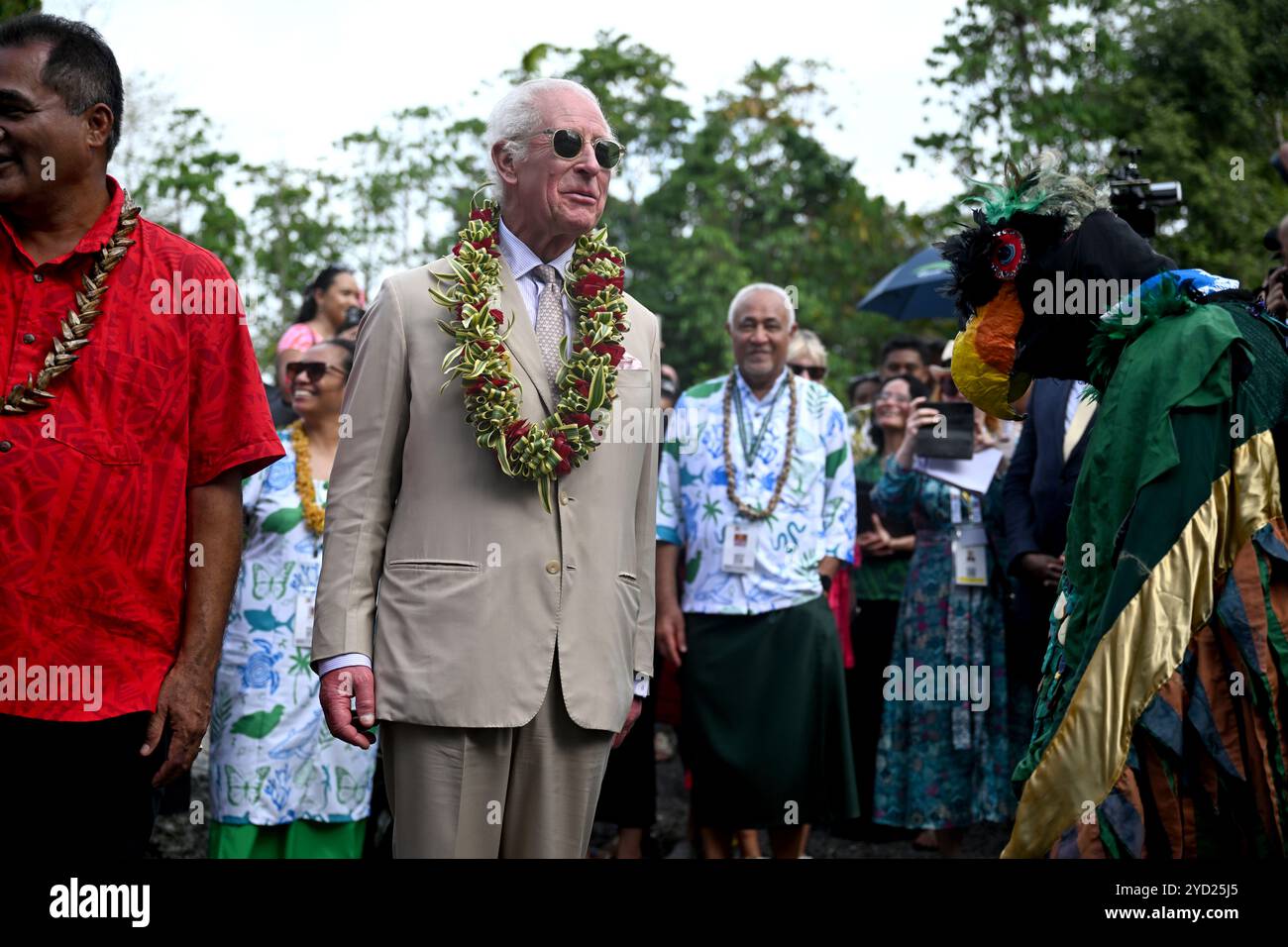 King Charles III meets a mascot of the national bird of Samoa, the ...