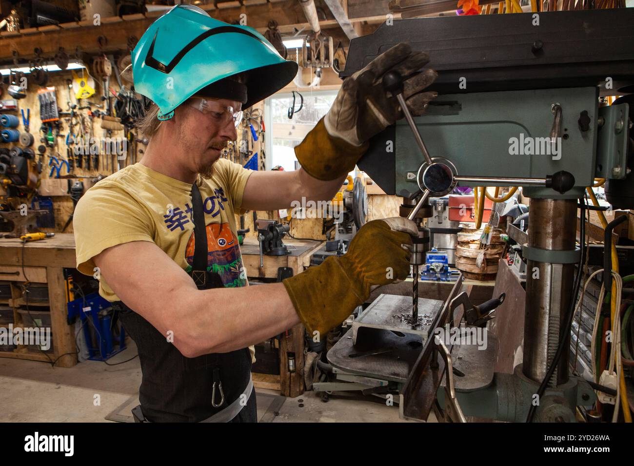 Worker using drilling machine hole hi-res stock photography and images ...
