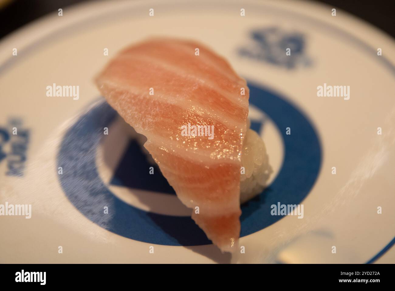A single Salmon Belly Sushi Stock Photo - Alamy