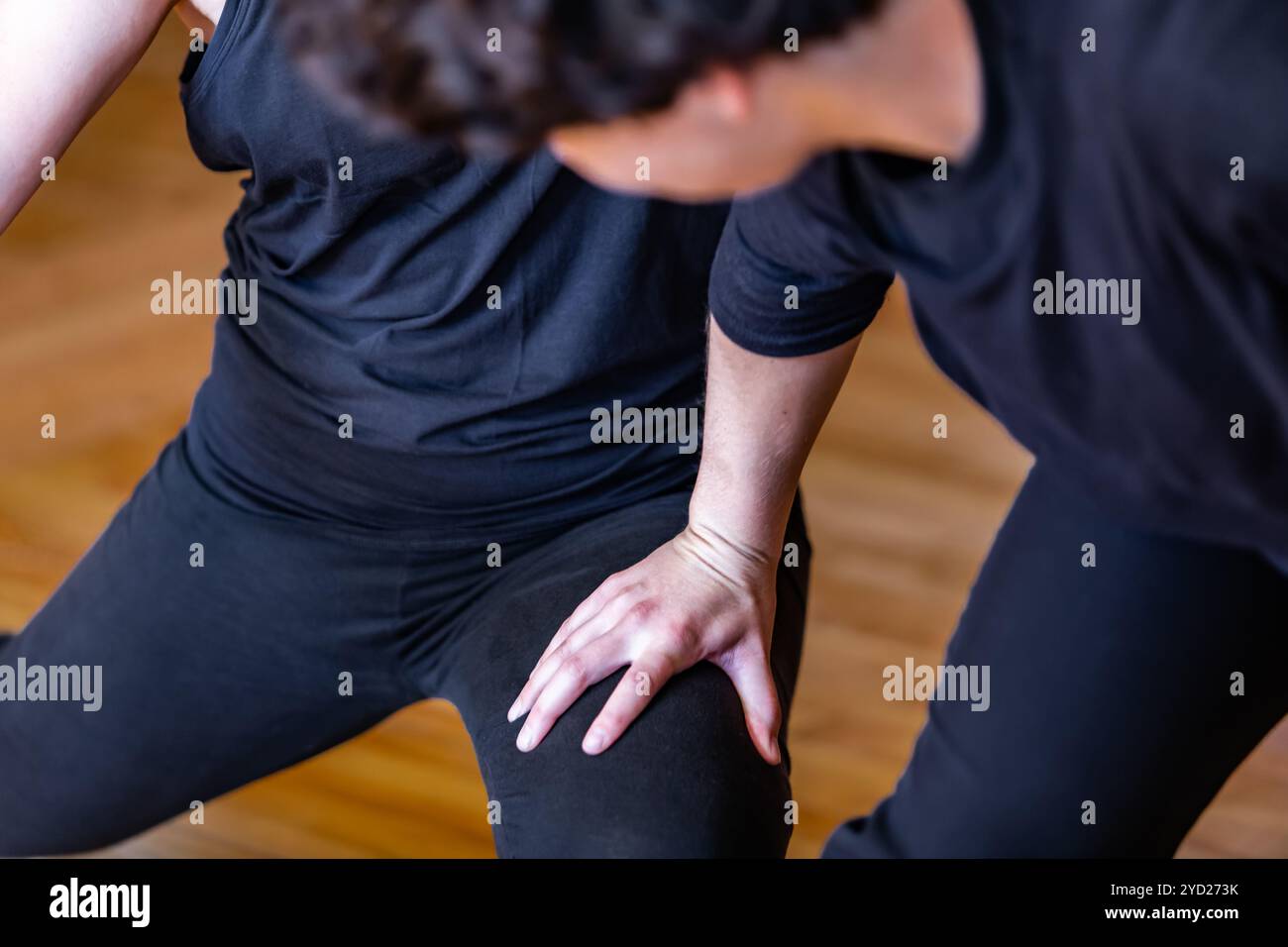 Selective view photo of personal fitness trainer and student practicing ...
