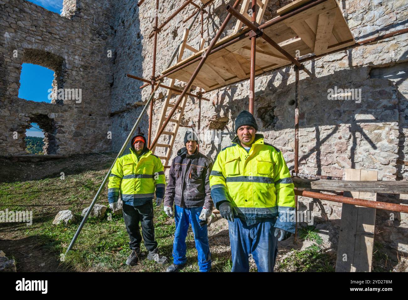 Work crew doing restoration work at Hanigovce Castle (Hanigovský hrad ...