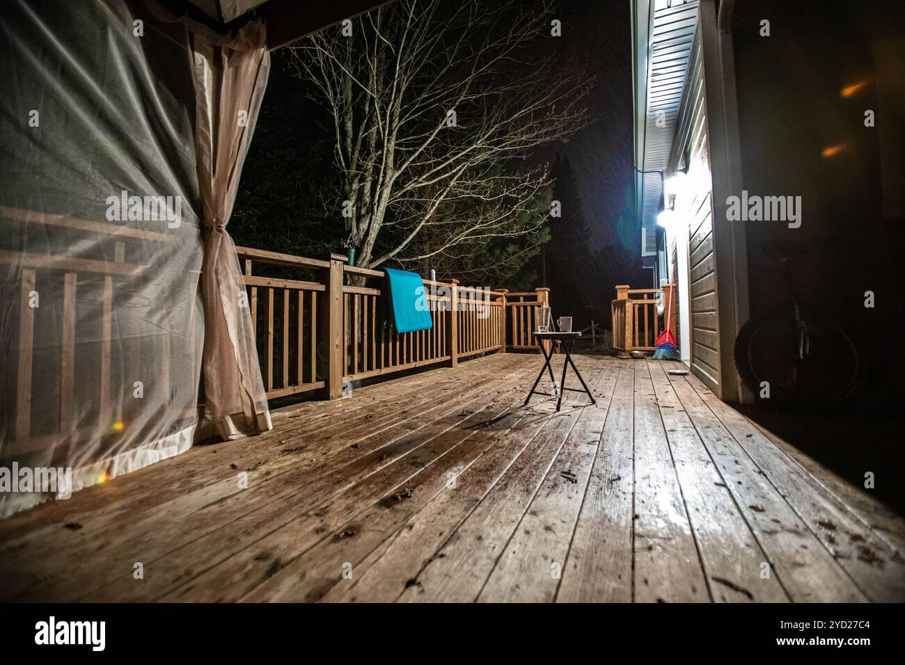 Backyard terrace illuminated by night Stock Photo - Alamy