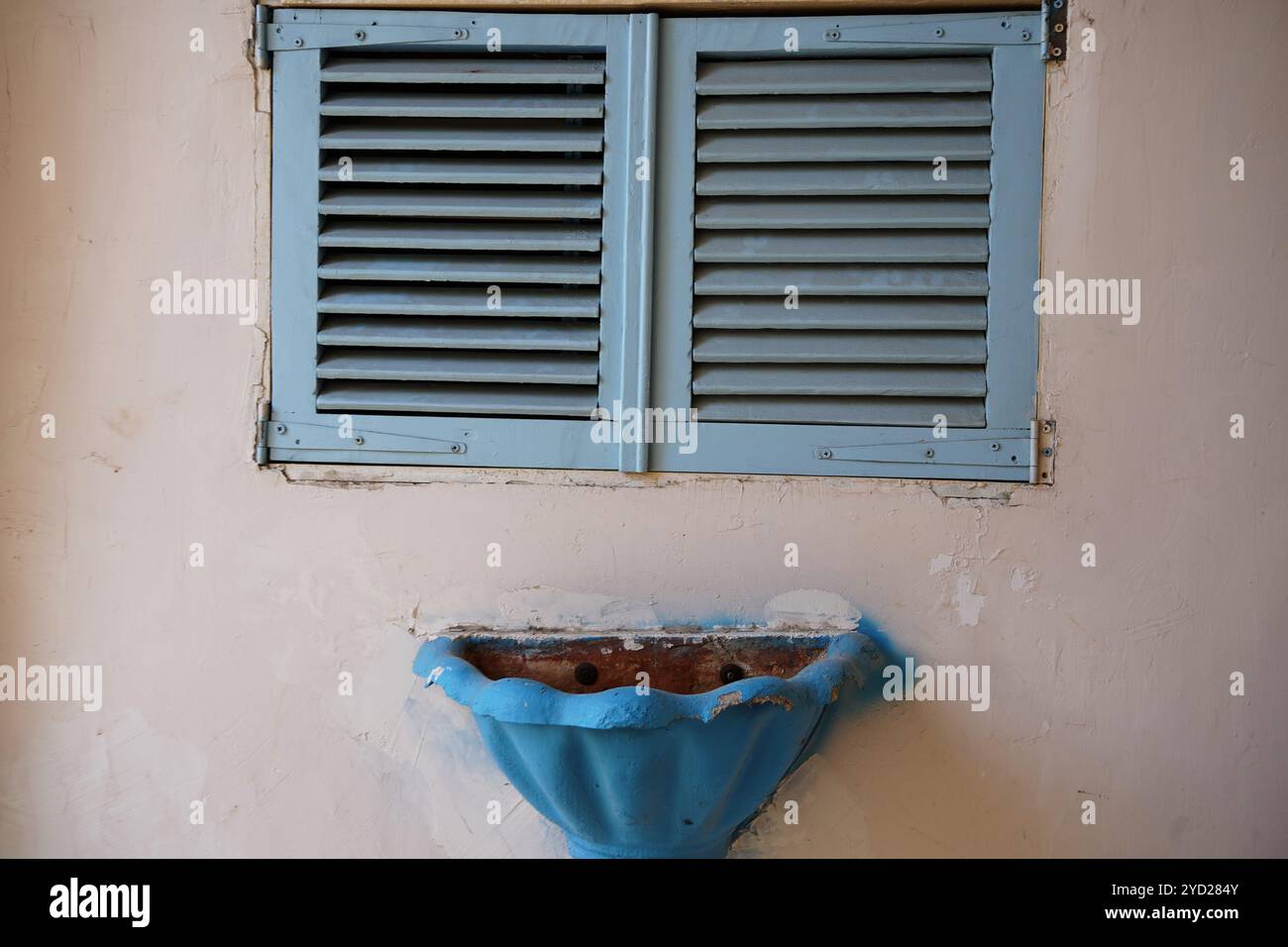 Old blue window and Hand Washing Basin Stock Photo - Alamy