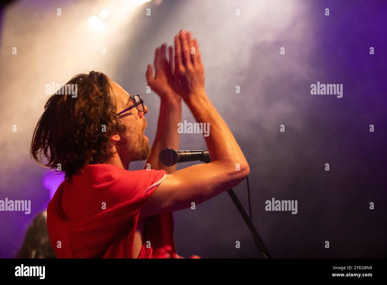 Male singer performing on stage hi-res stock photography and images - Alamy