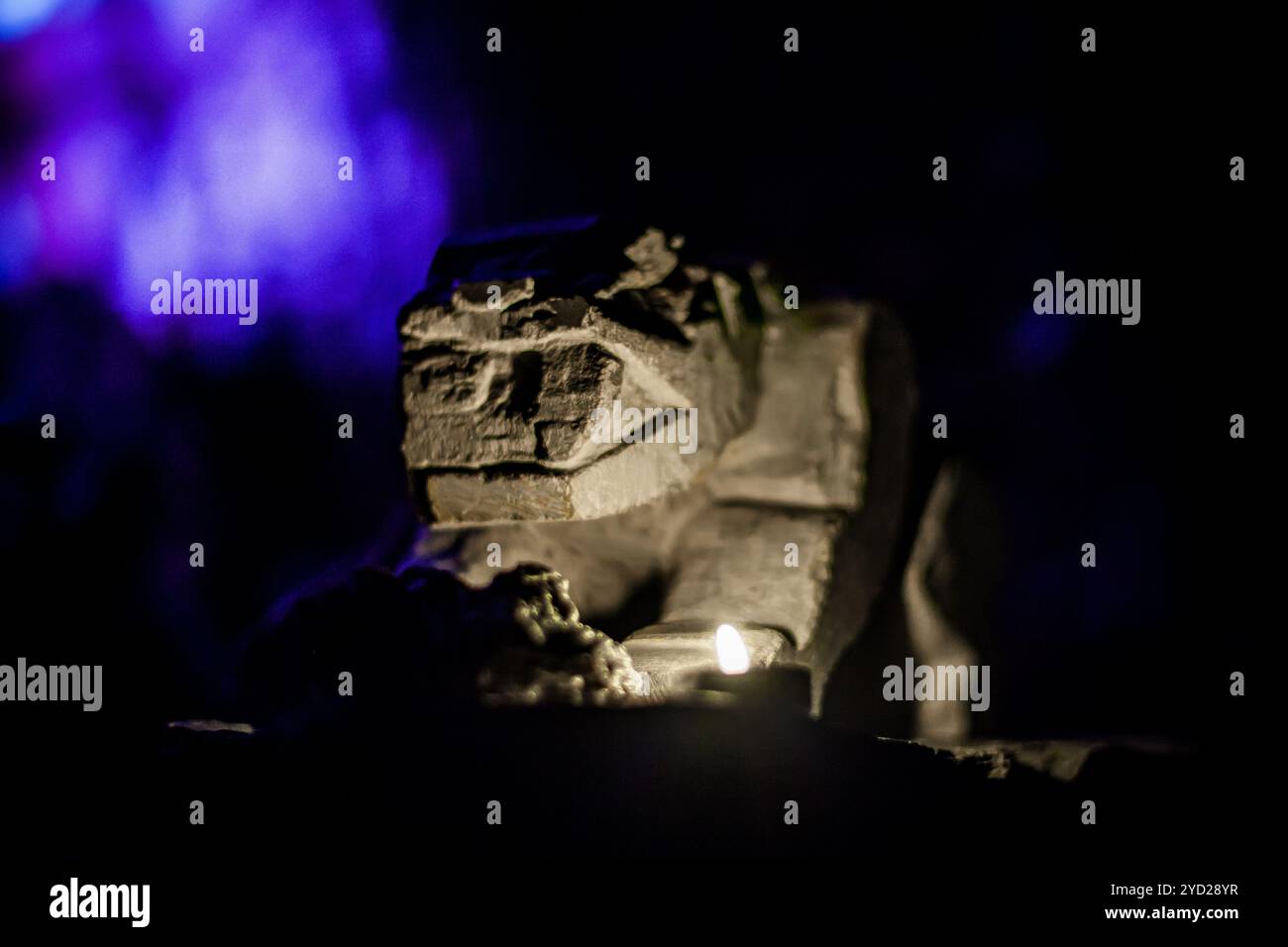 Gargoyle sculpture outdoors at night Stock Photo - Alamy